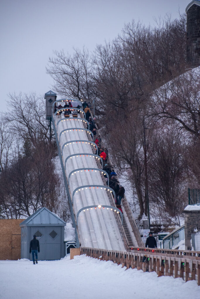 Riding the Dufferin Terrace Toboggan Slide in Quebec City - Come Join ...